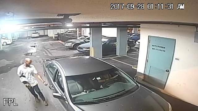 Man Woman Caught On Camera Burglarizing Car In Miami Parking Garage
