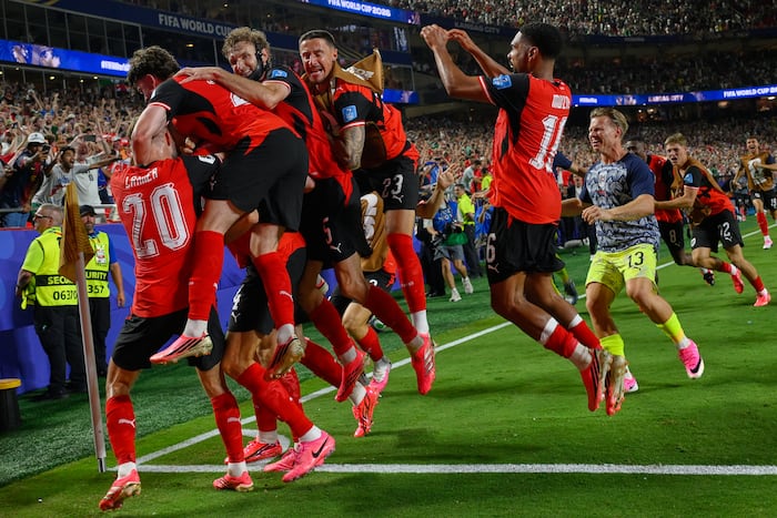 Austria, Algeria trade goals in stoppage time, both advance at World ...