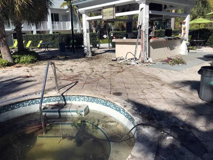 Driver in police pursuit crashes into Key West hotel pool area ...