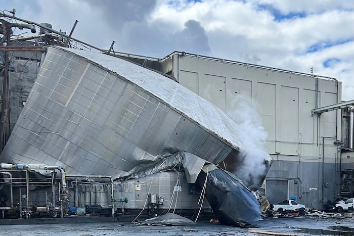 At least 1 dead, 9 others missing in chemical tank implosion at ...